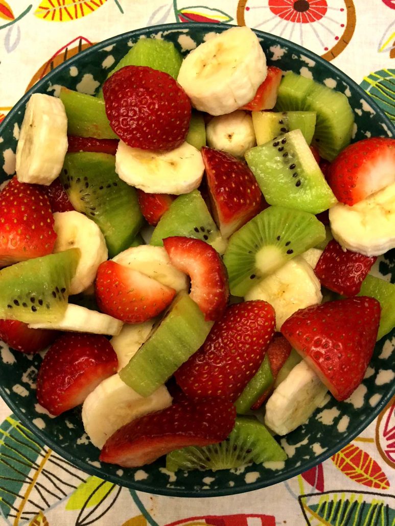 Christmas Fruit Salad With Strawberries Kiwis And Bananas Red Green Christmas Fruit Salad With Strawberries Kiwis And Bananas Red Green